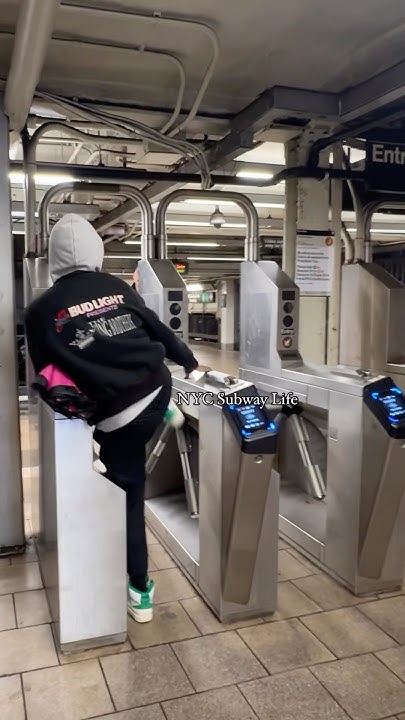 Fare Evader tries to jump the new Crescent-Shaped metal shields installed on turnstiles. # ...