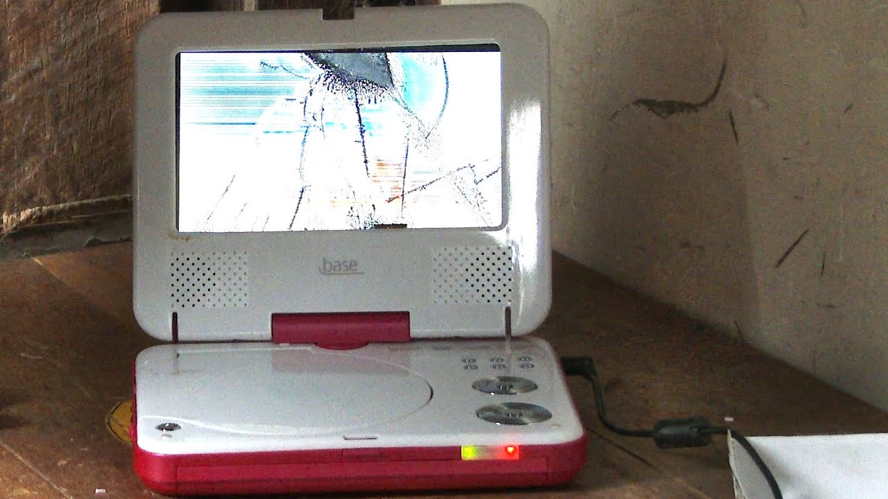 Smashing a Base TF-DVD7307 Portable DVD Player - YouTube