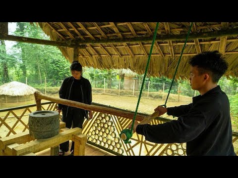 Pao, taş değirmenini küçük kulübenin içine kurmayı bitirdi.