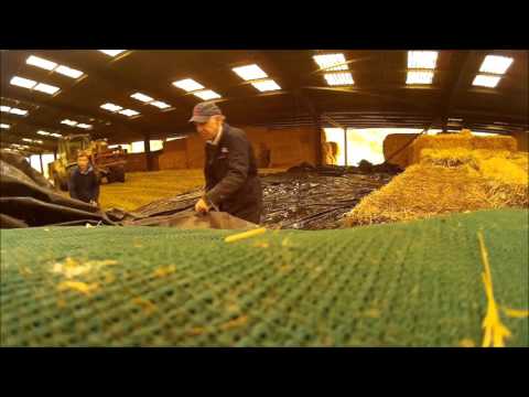 sheeting the maize silage clamp - YouTube