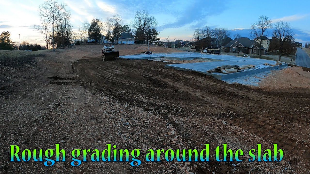 Digging A Water Line And Rough Grading Around This New Slab House - YouTube