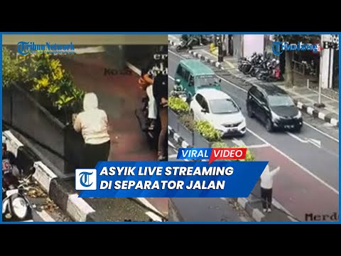 Viral Wanita Asyik Live Streaming di Separator Jalan