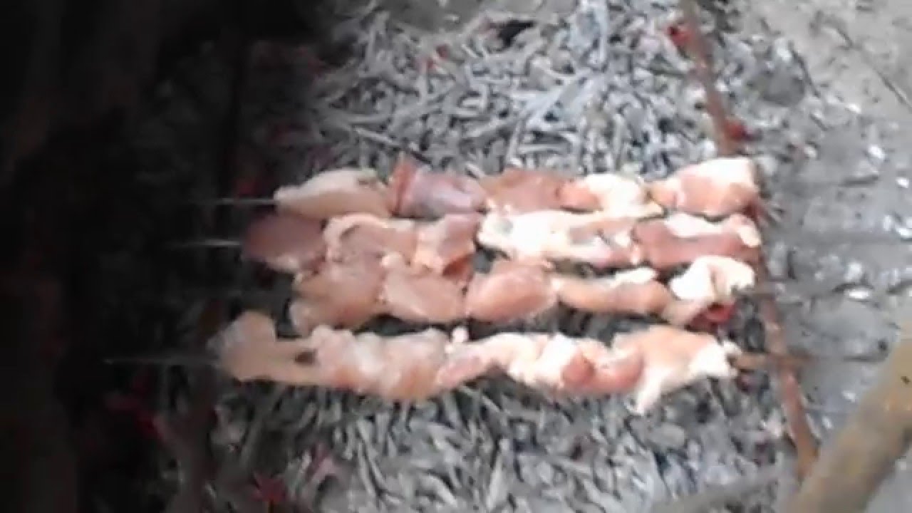 How To Roast Pig Meat From Sticks - YouTube