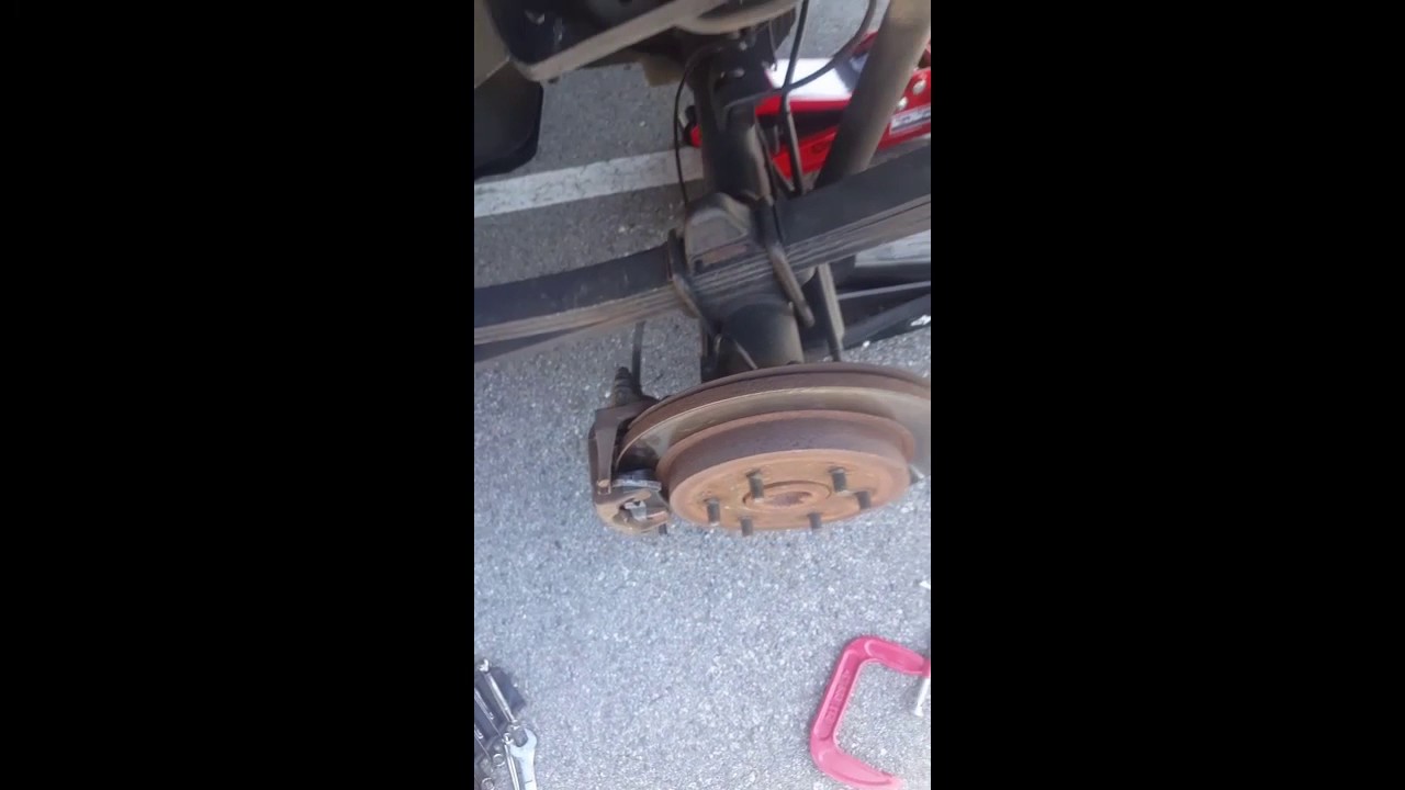 Install drop shackles on 2005 titan - YouTube