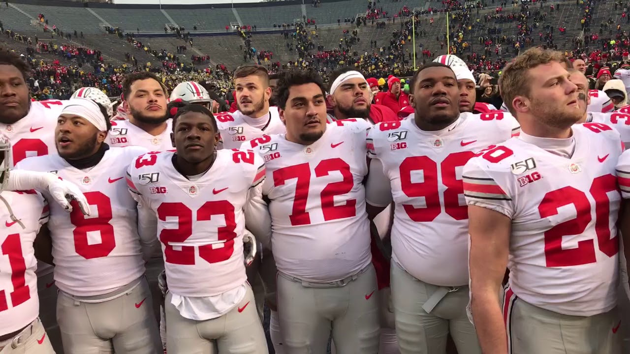 Buckeye players sing Carmen Ohio in Michigan - YouTube