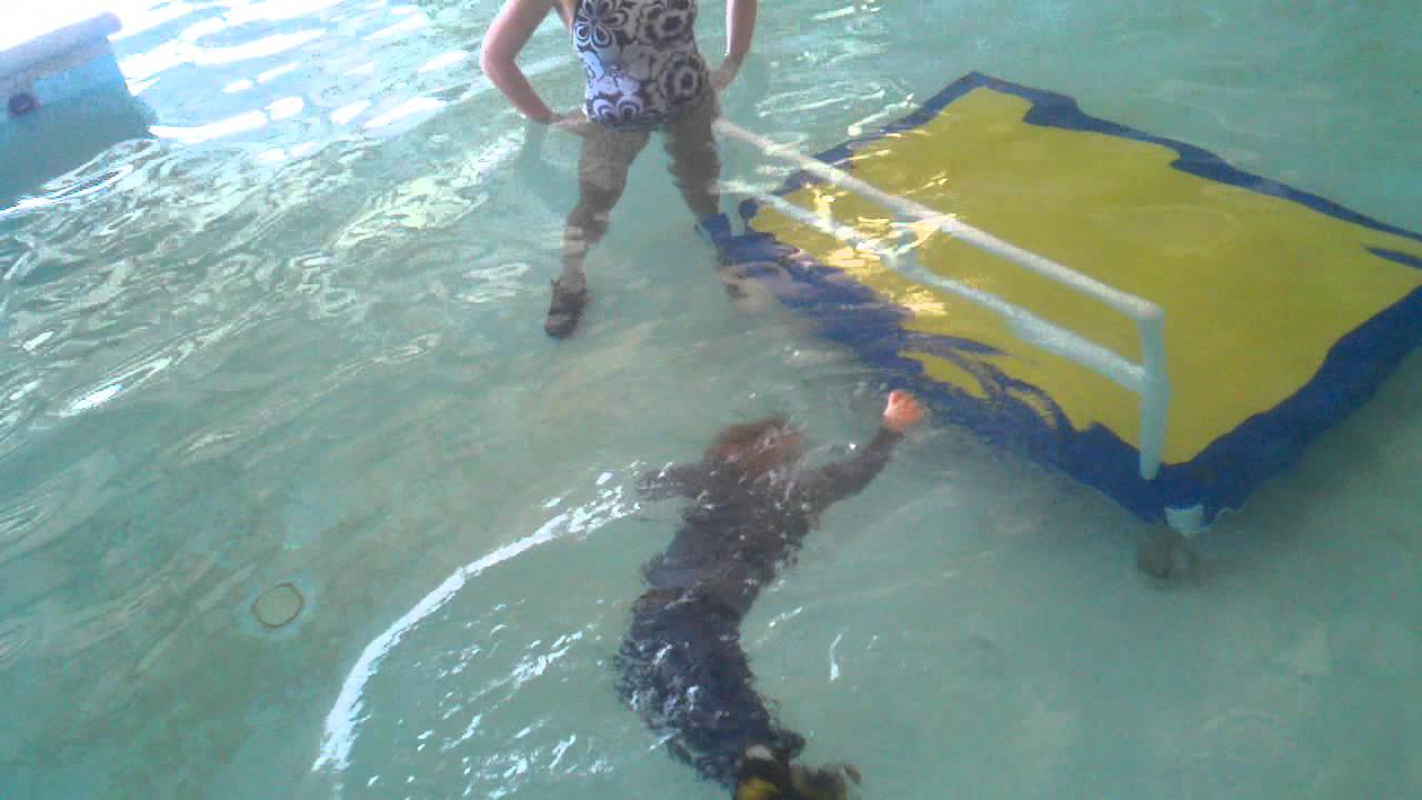 Survival swim test winter clothes - YouTube