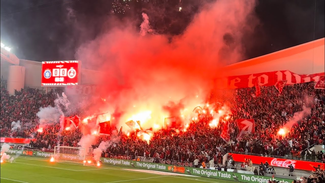 מופע אבוקות של אוהדי הפועל תל אביב בדרבי התל אביבי - שורפים את רשת ...