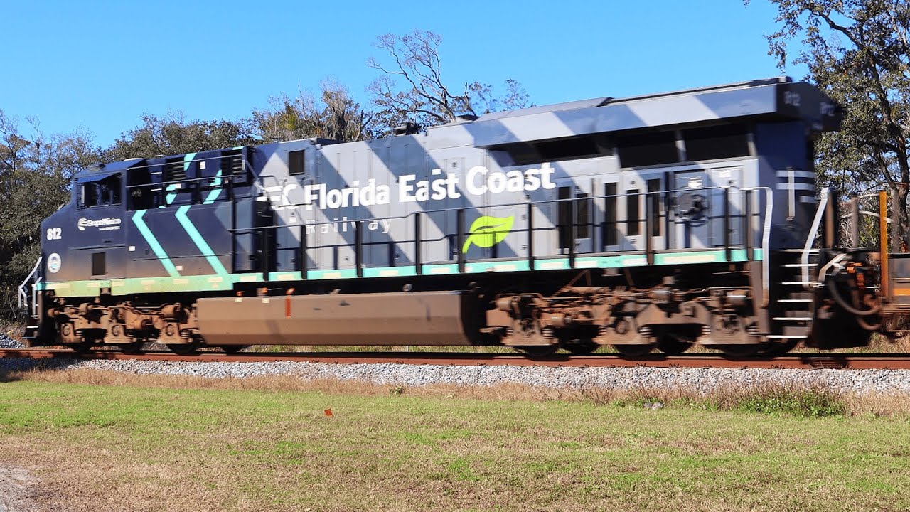 FEC 105 passes by St. Augustine with a Champ GEVO trailing | 12/30/24 ...