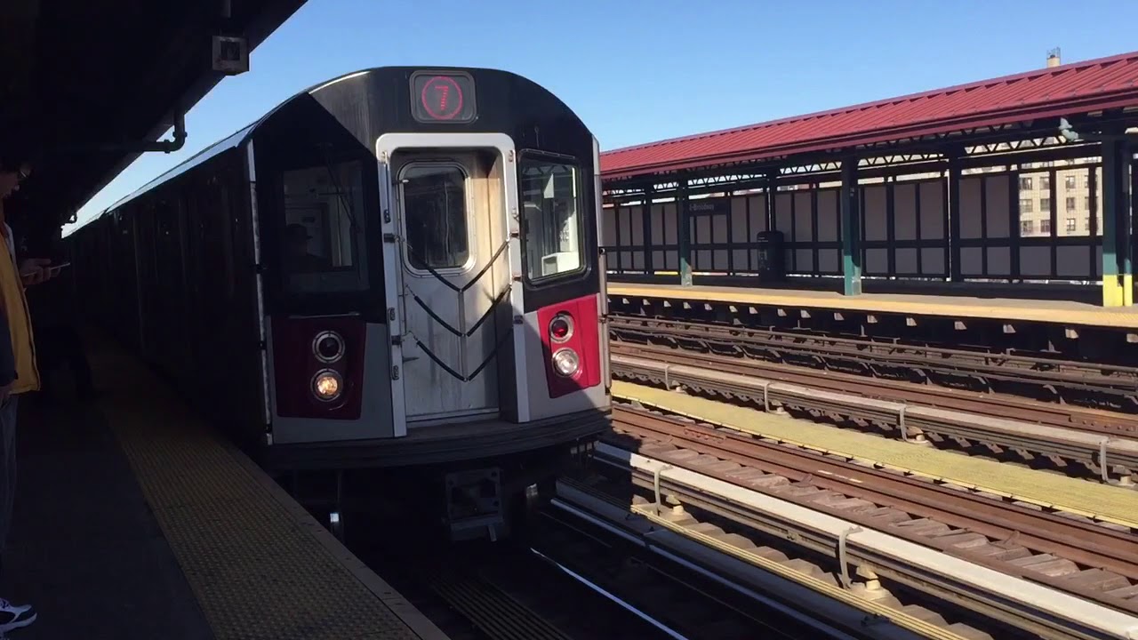 Flushing and 34th Street Bound 7 Trains At 74th Street Broadway - YouTube