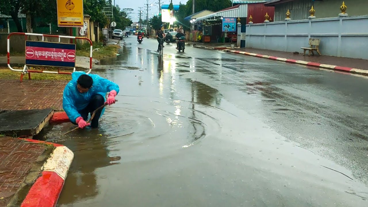 Removal Rain Water Out On Street Road - Unclogged Culvert Drain Rain ...