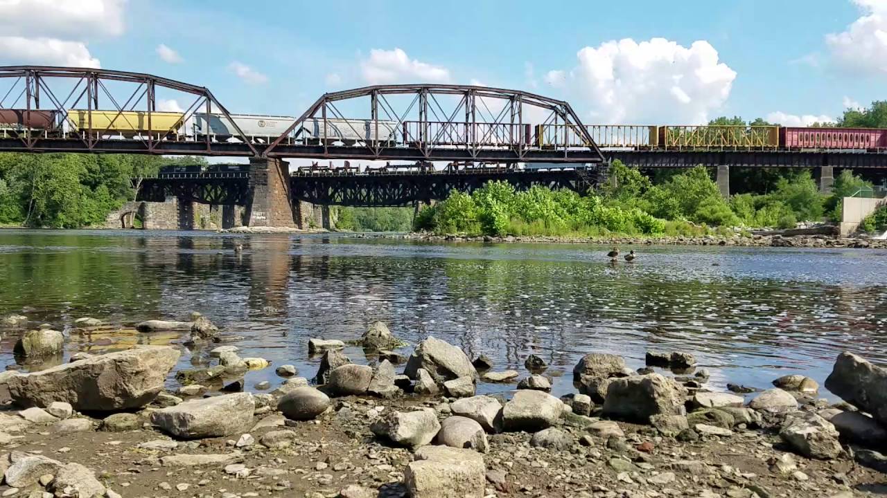 Two trains crossing the Delaware River/Lehigh river in Pennsylvania ...