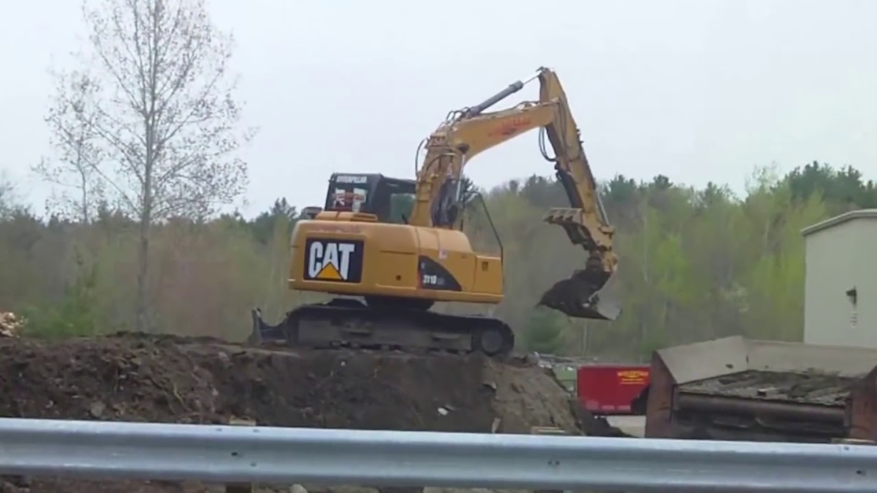 Caterpillar 311D LRR - YouTube