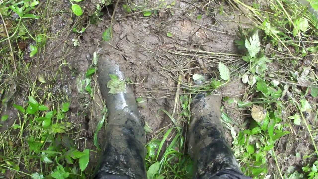 Black Boots sinking in deep mud - YouTube