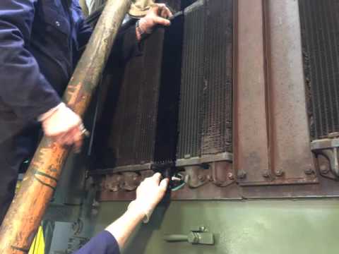 Installation of remanufactured diesel locomotive radiators - YouTube