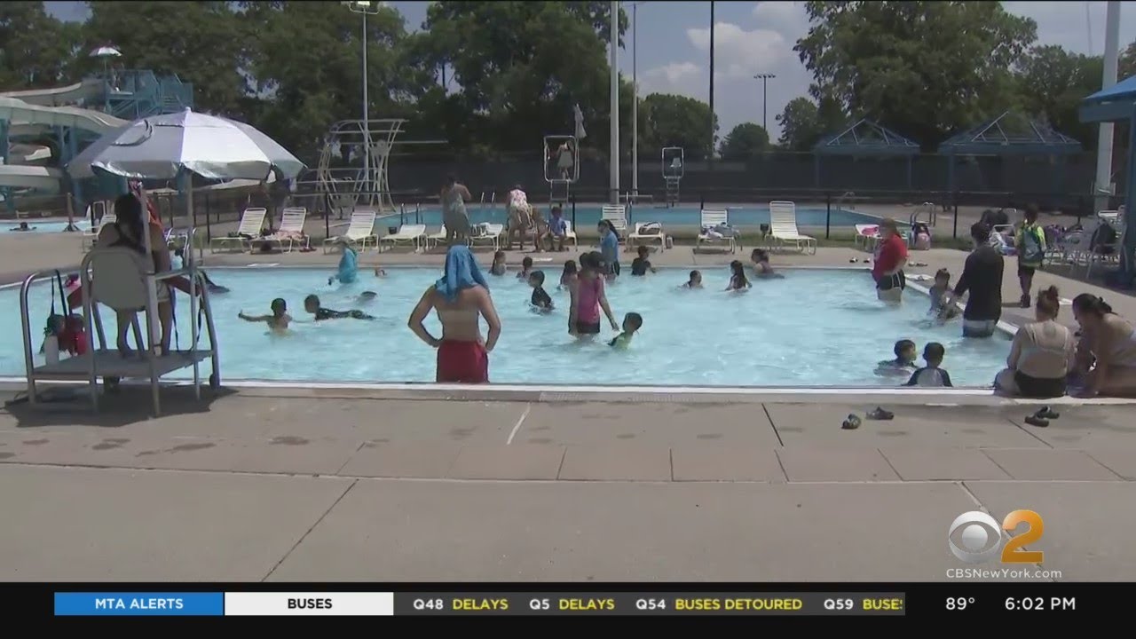 Suffolk County residents try to stay cool amid heat wave - YouTube