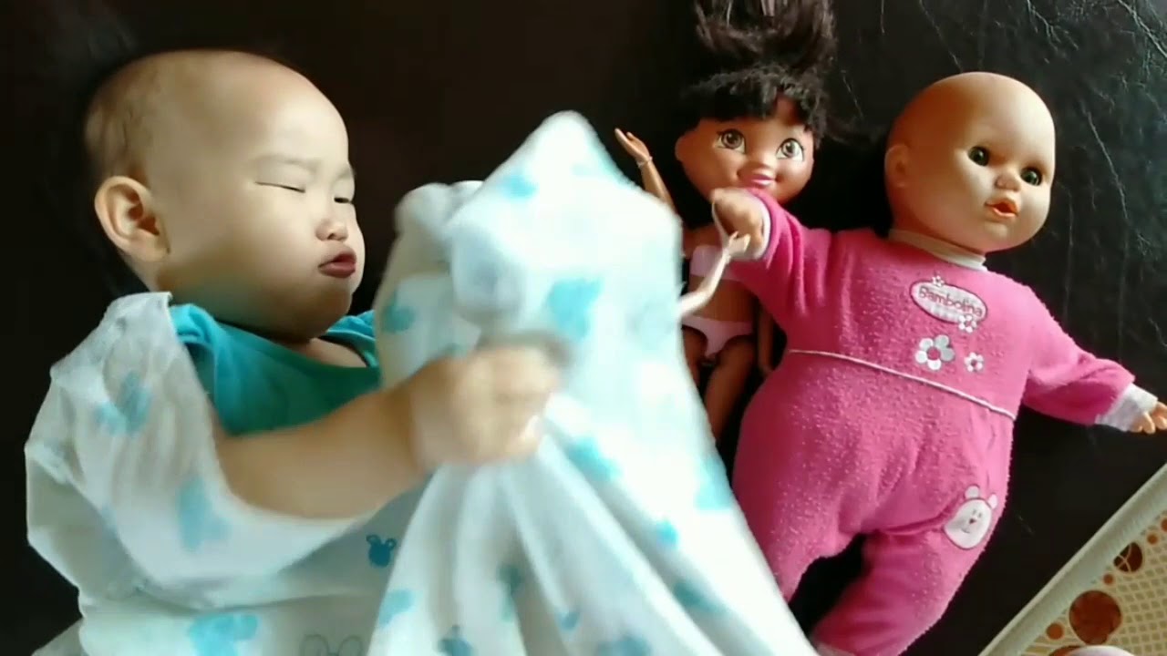 Emma play with her baby doll. - YouTube