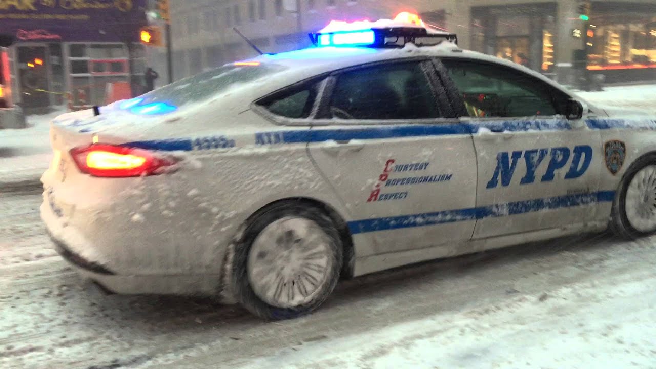 NYPD CRUISER PATROLLING ON 8TH AVE. DURING WINTER STORM JONAS IN ...