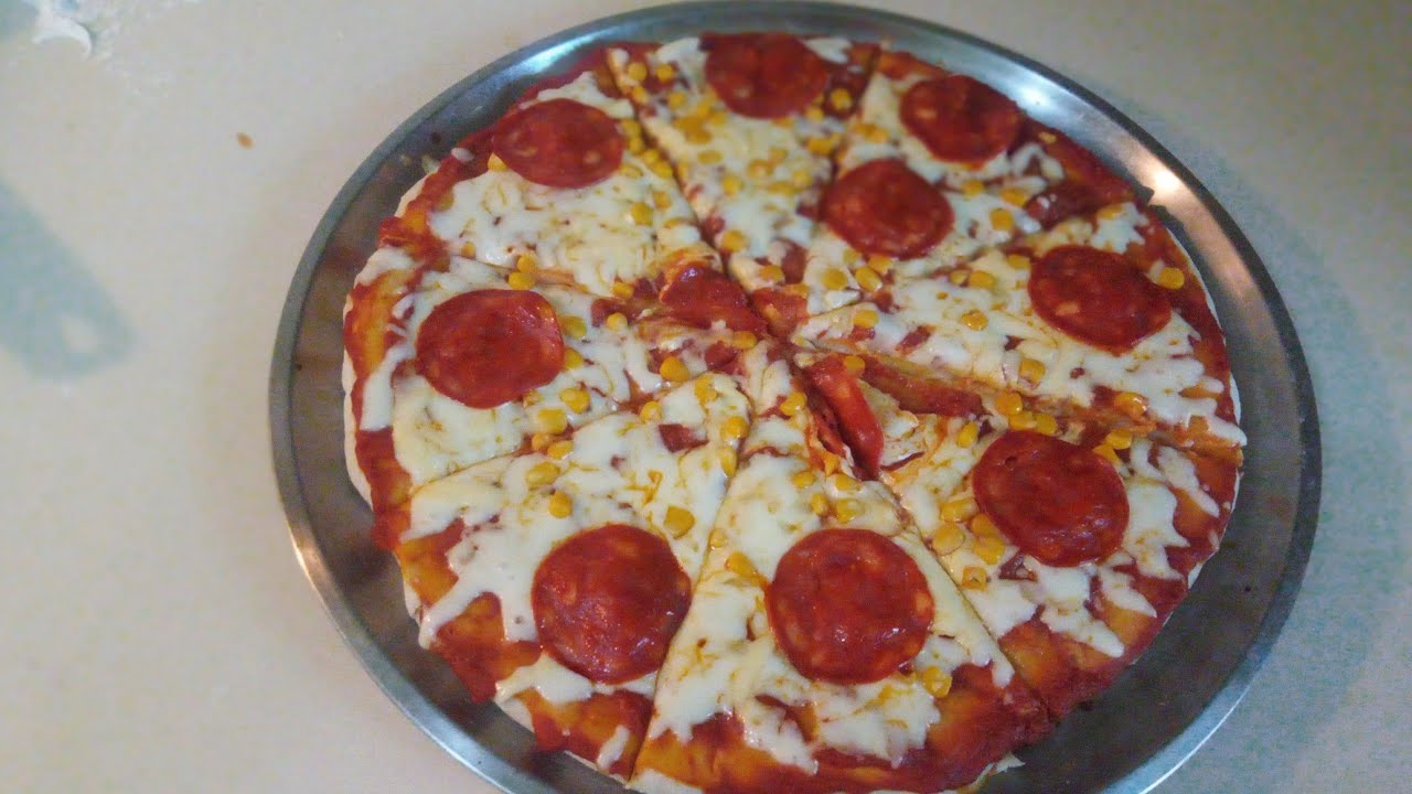 Como hacer una pizza especial - YouTube