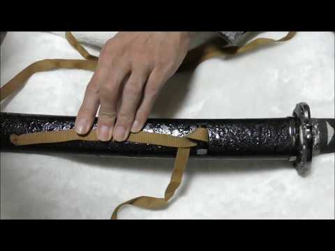 How to tie a Japanese sword strap “Sword lowering” One way of sword strap