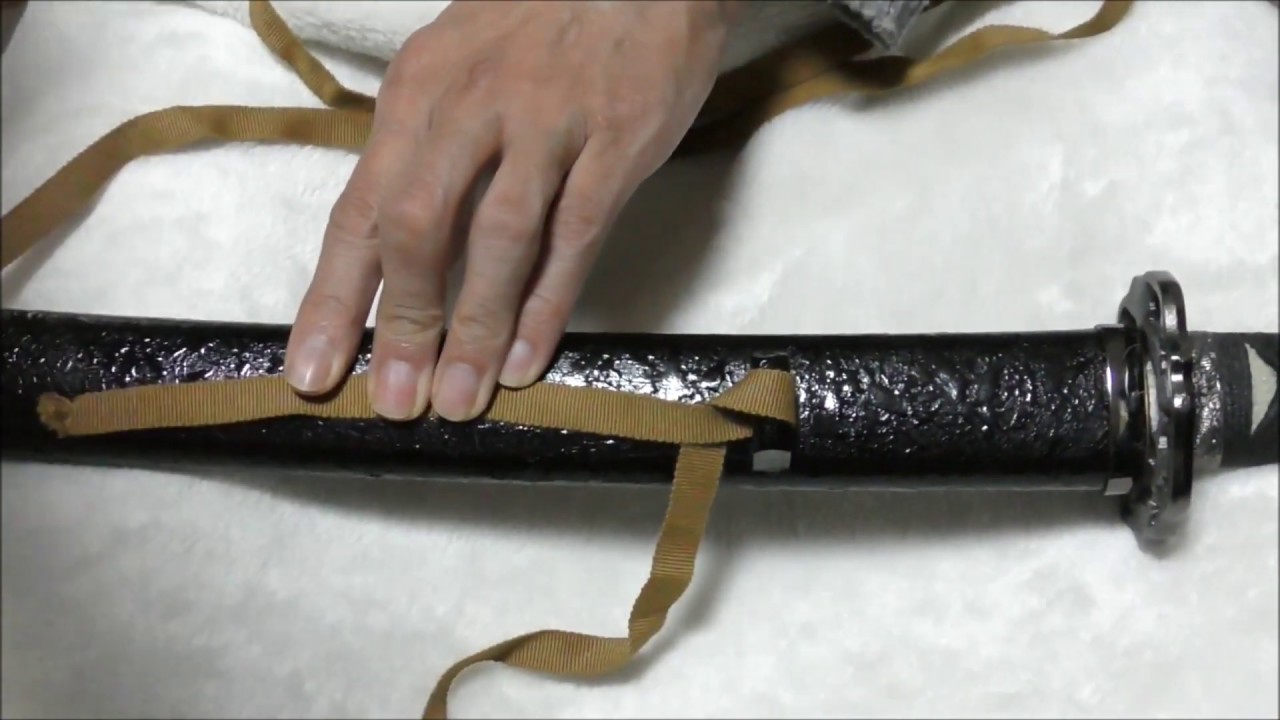How to tie a Japanese sword strap “Sword lowering” One way of sword ...