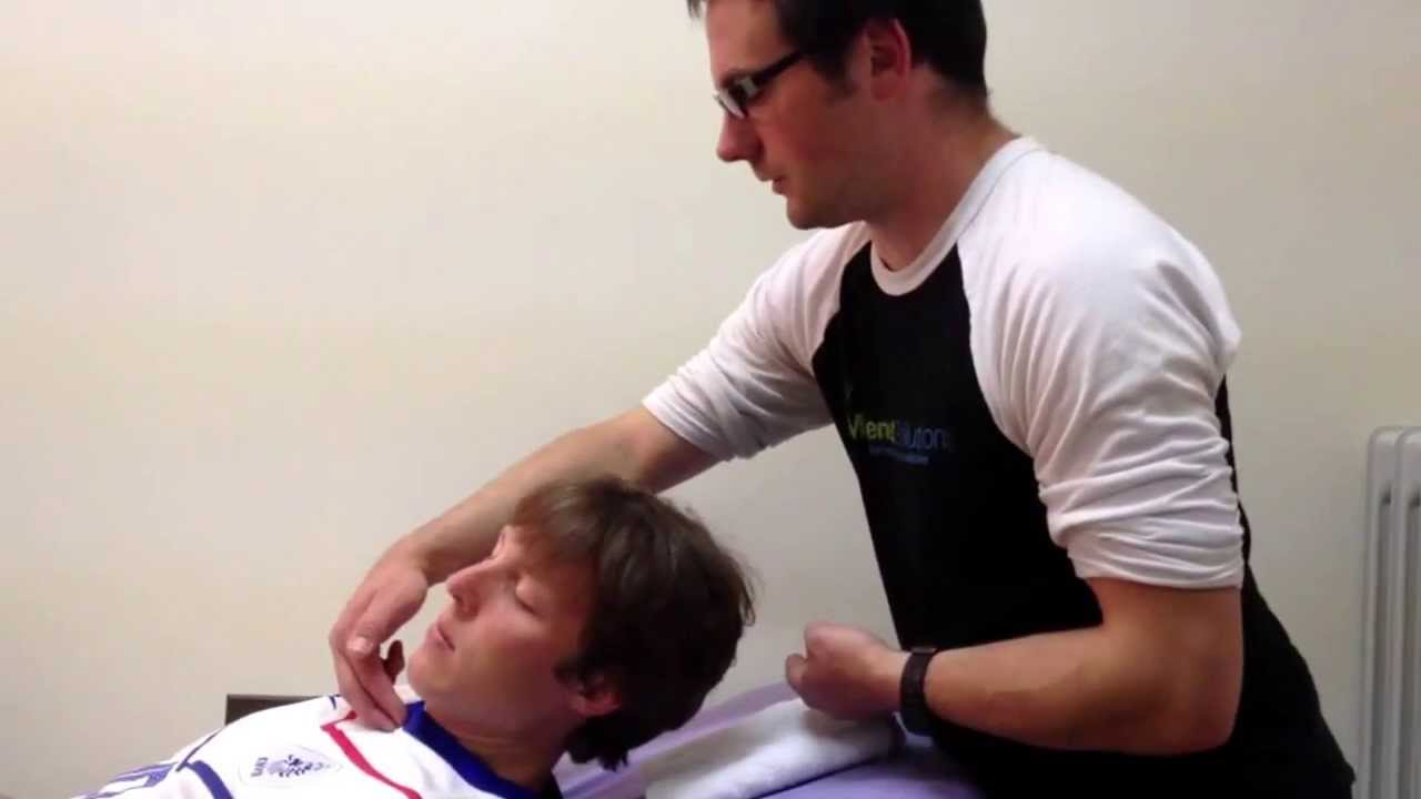 Supine on Wedge: deep neck flexor activation with rotation - YouTube