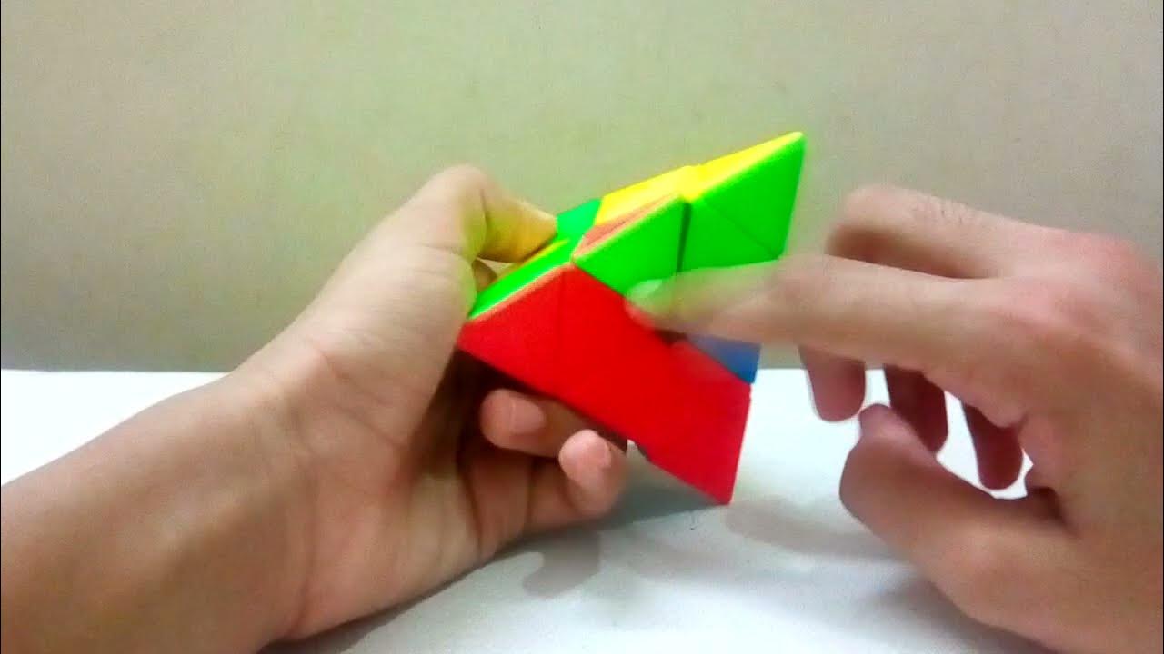 HOW TO SOLVE PYRAMINX CUBE - YouTube
