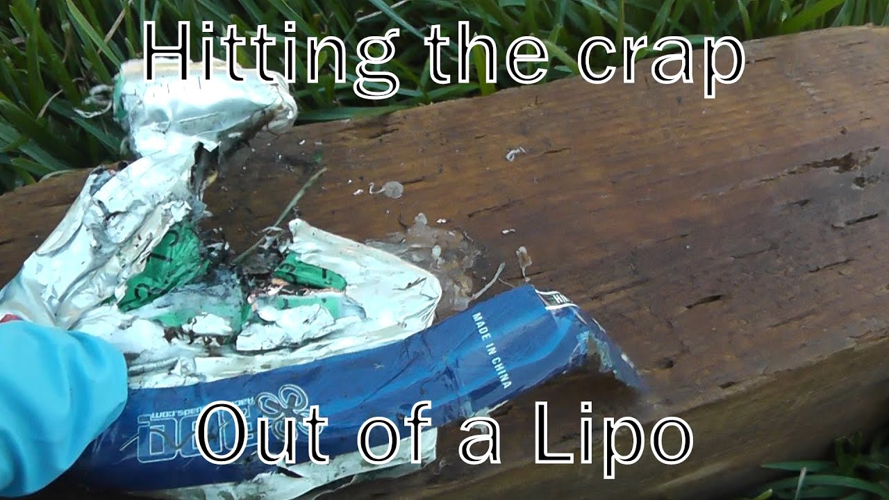 Hitting a exploding lipo battery with a nail and hammer - YouTube
