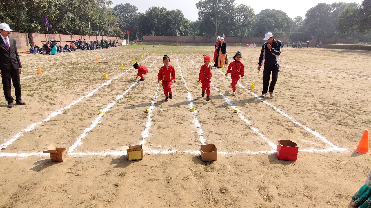 Kindergarten section student playing game Smiley Ball Race on Sports ...
