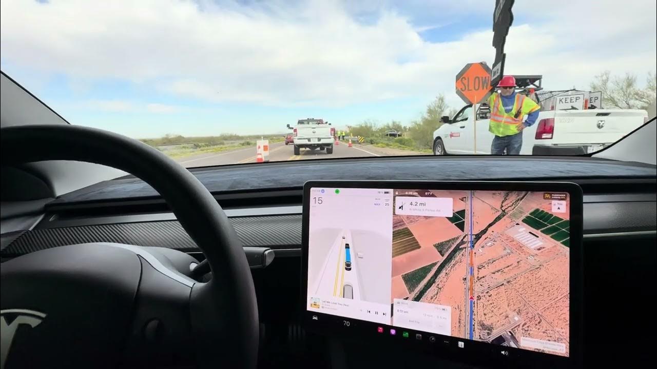 Tesla FSD (Supervised) navigates construction with crossover - YouTube