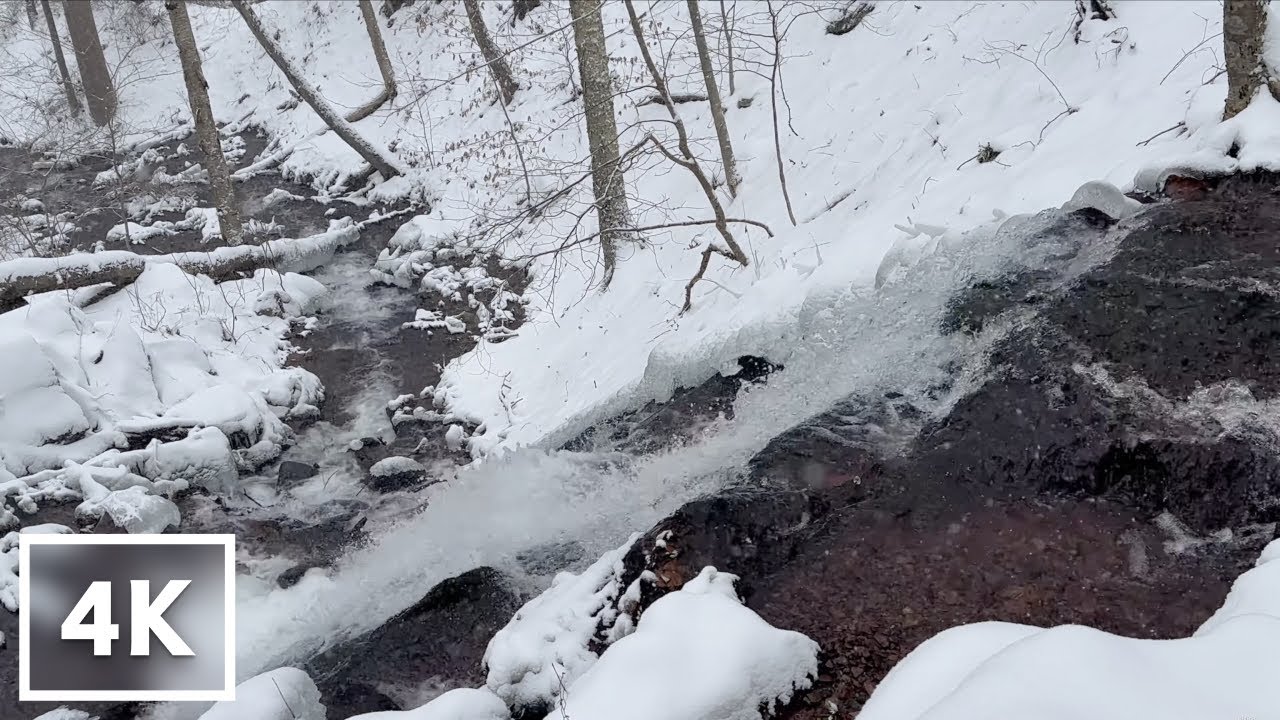 Top of a waterfall in the snow looking down - YouTube
