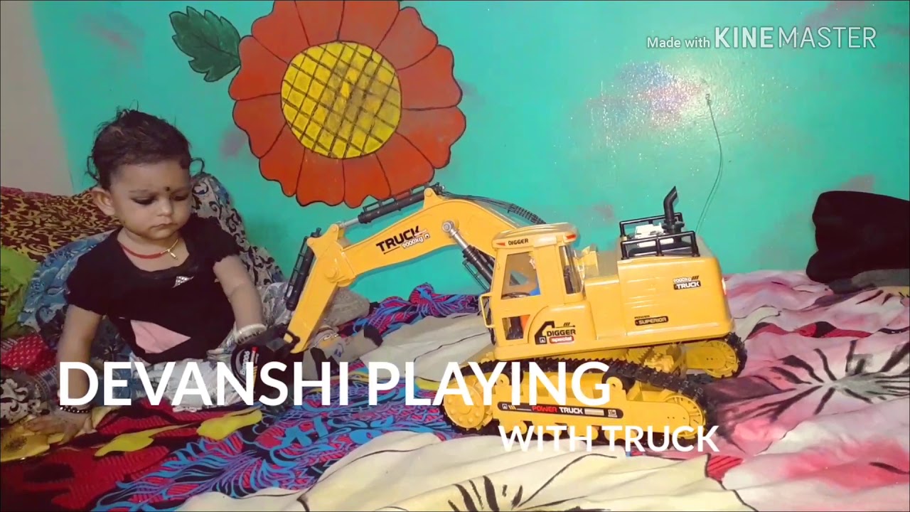 Baby playing with JCB - YouTube