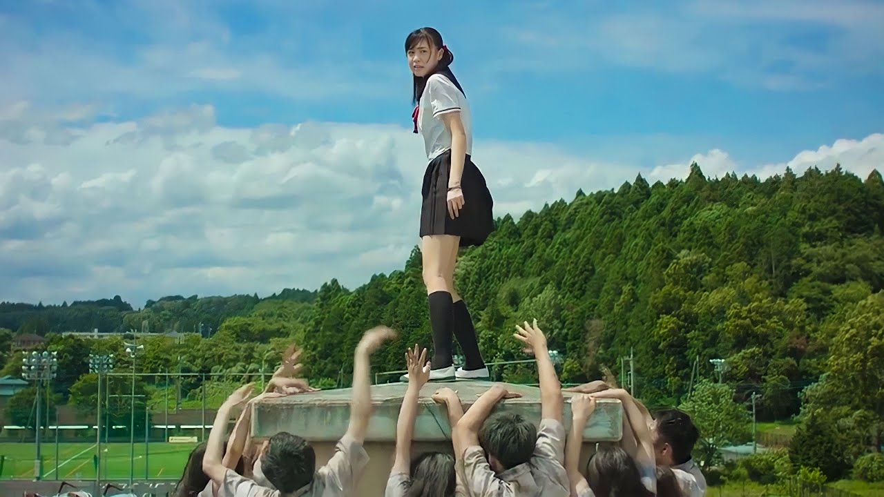 She Stands on the Roof of Her School After All the Students Become ...