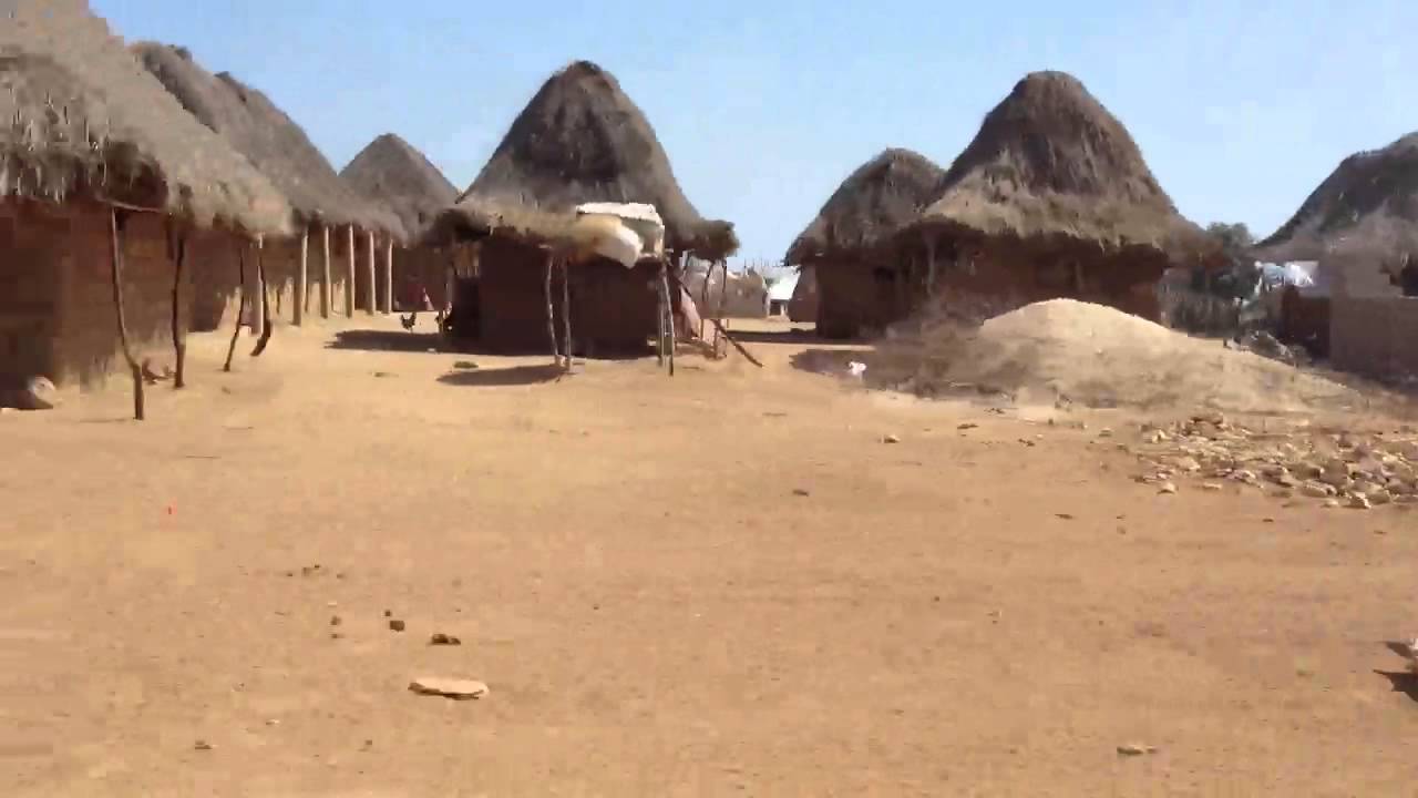 Driving thru Angolan village - YouTube
