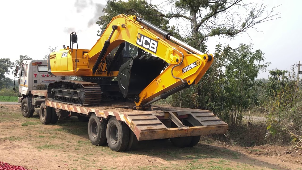 Jcb js205 delivery - YouTube