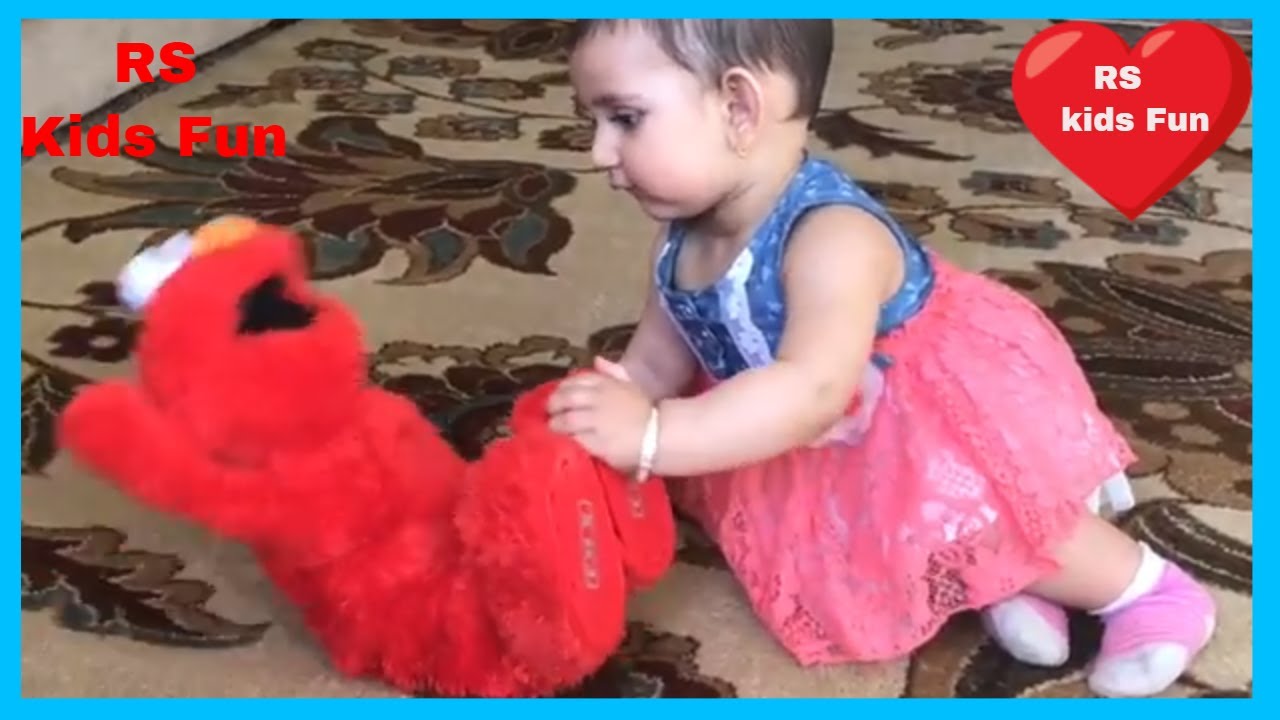 Little Cute Baby playing With Talking Elmo - YouTube