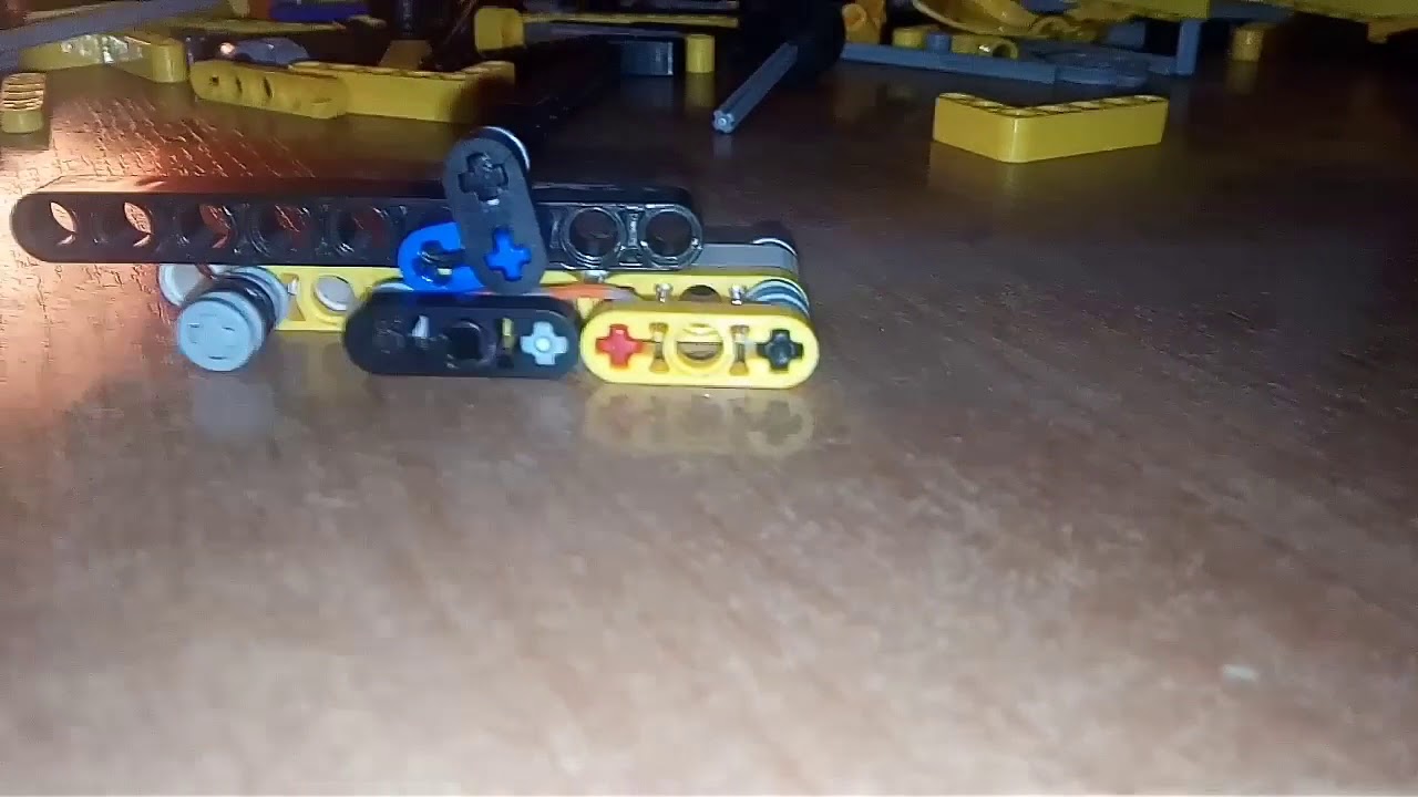 Lego shell ejecting gun mechanism - YouTube