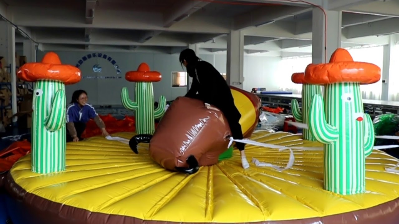 inflatable bull riding - YouTube