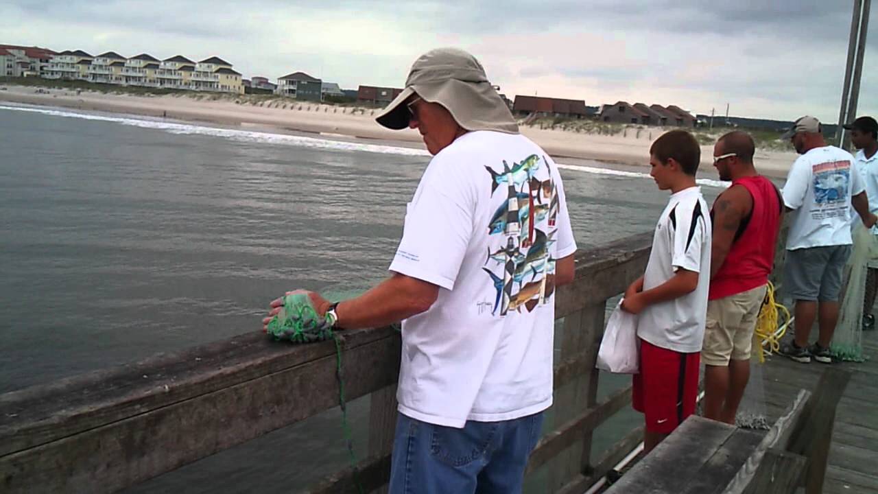 Catching Menhaden bait fish off Seaview Fishing Pier - YouTube