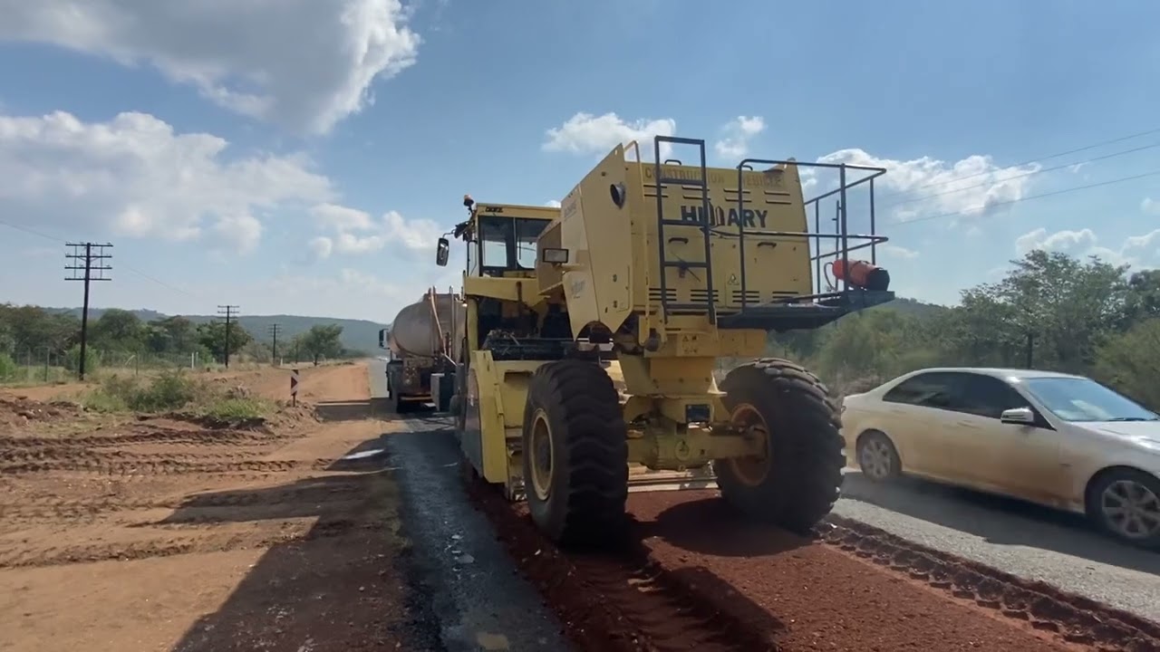 Road construction using a recycler in South Africa - YouTube