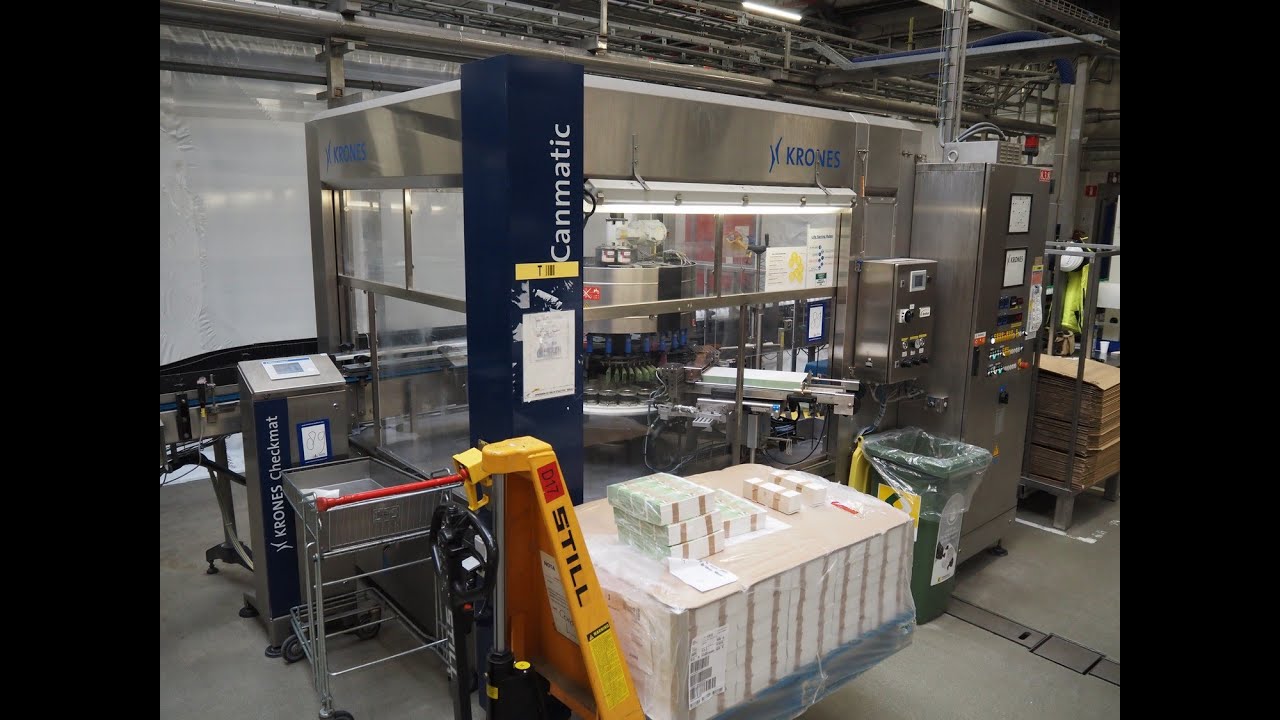 1498-89: Krones AG wrap around labelling machine - YouTube