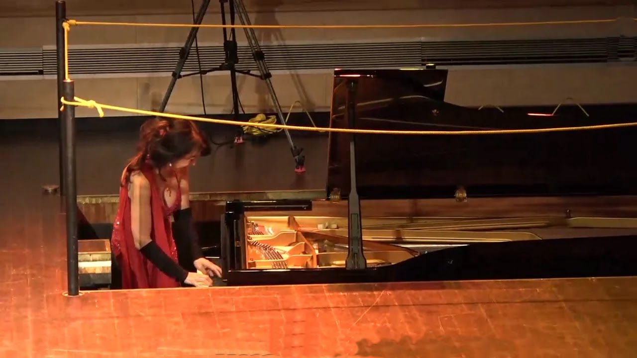 Brazilian pianist, Eliane Rodrigues, LITERALLY taking the performance ...