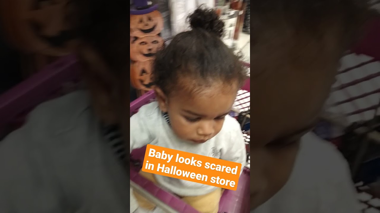 baby looks scared in Halloween store - YouTube
