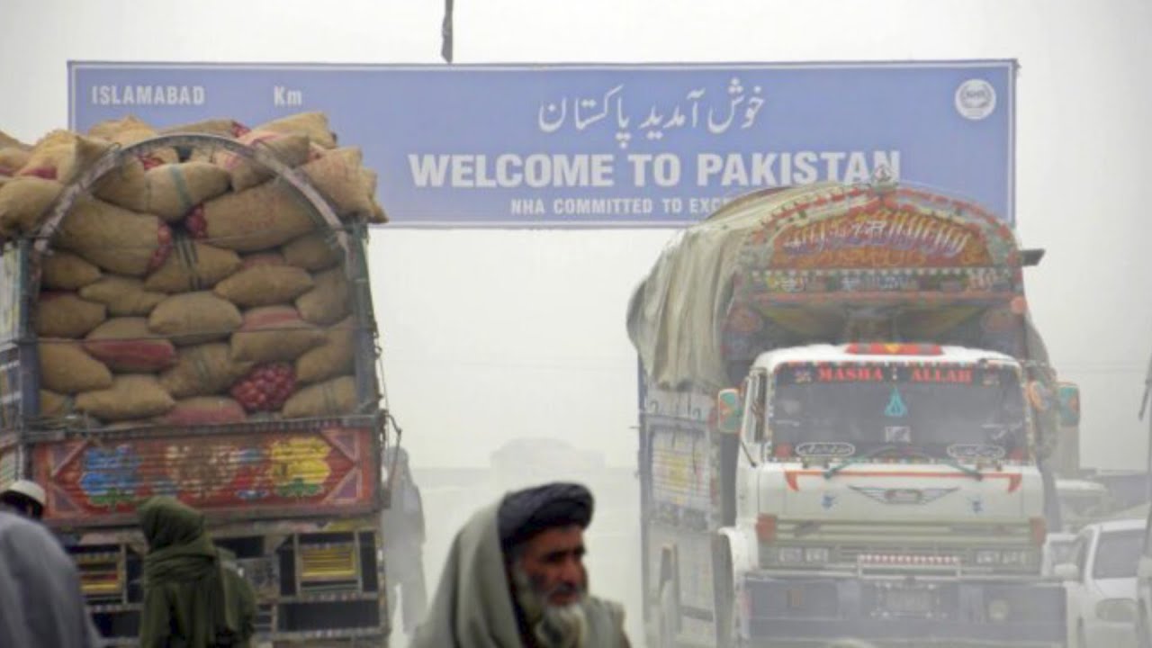 Hundreds of trucks are lined up at the key border-crossing in Chaman ...