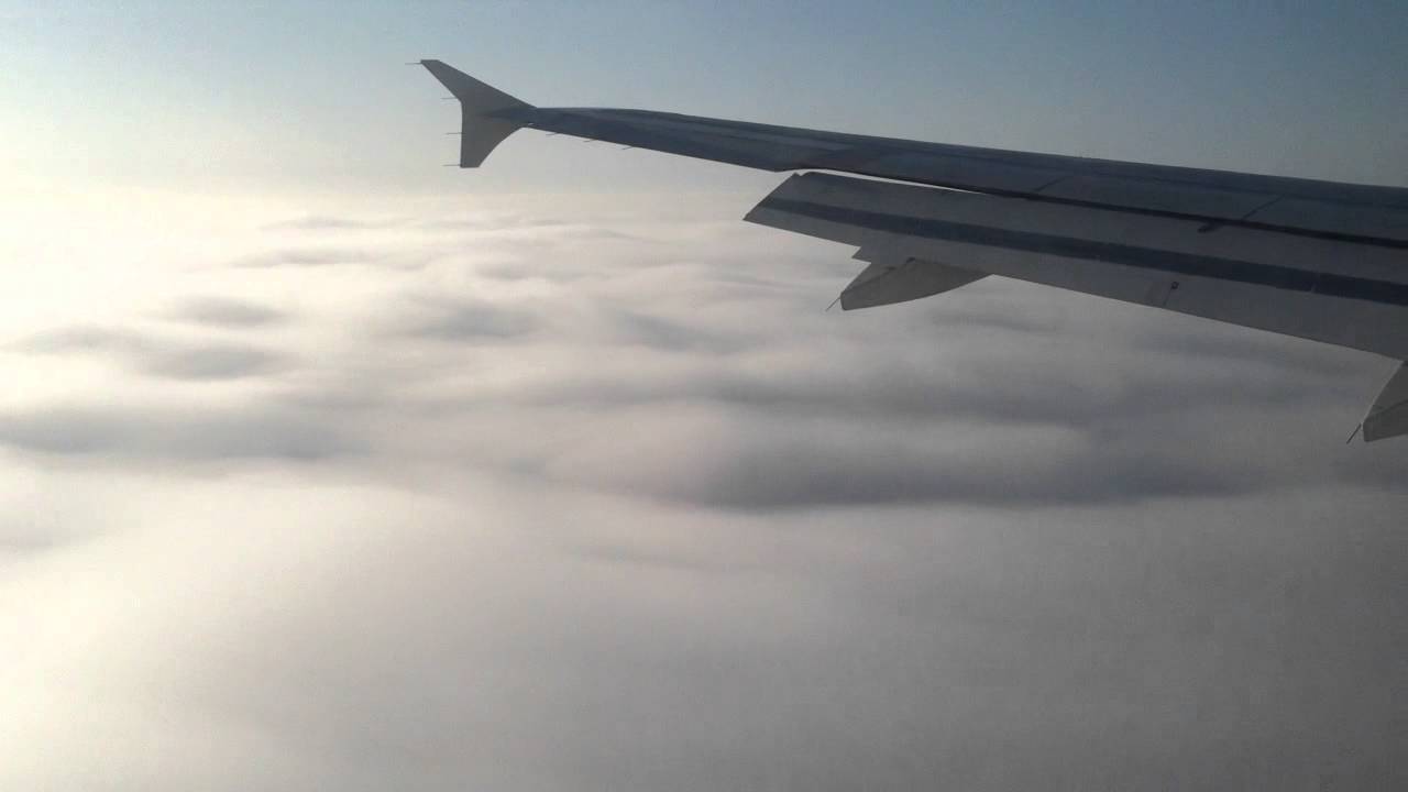 Unexpected end to airplane going through clouds - YouTube