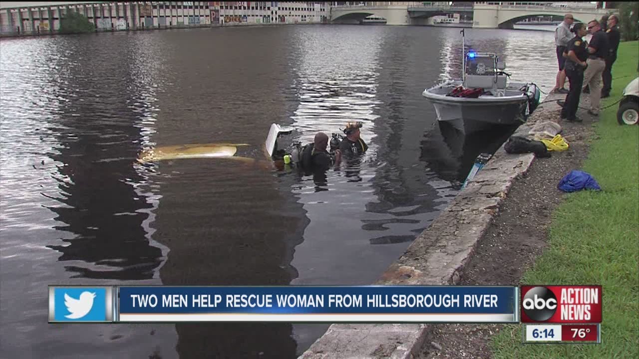 Two men rescue woman from sinking car - YouTube