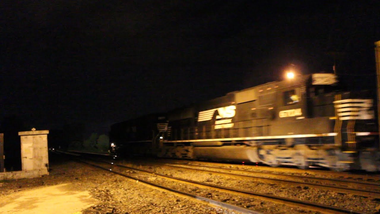 NS SD70M-2 & SD60 (ex-CR) head West with a cut of loaded Autoracks ...