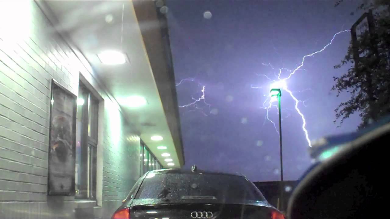 lightning strikes light post! - YouTube
