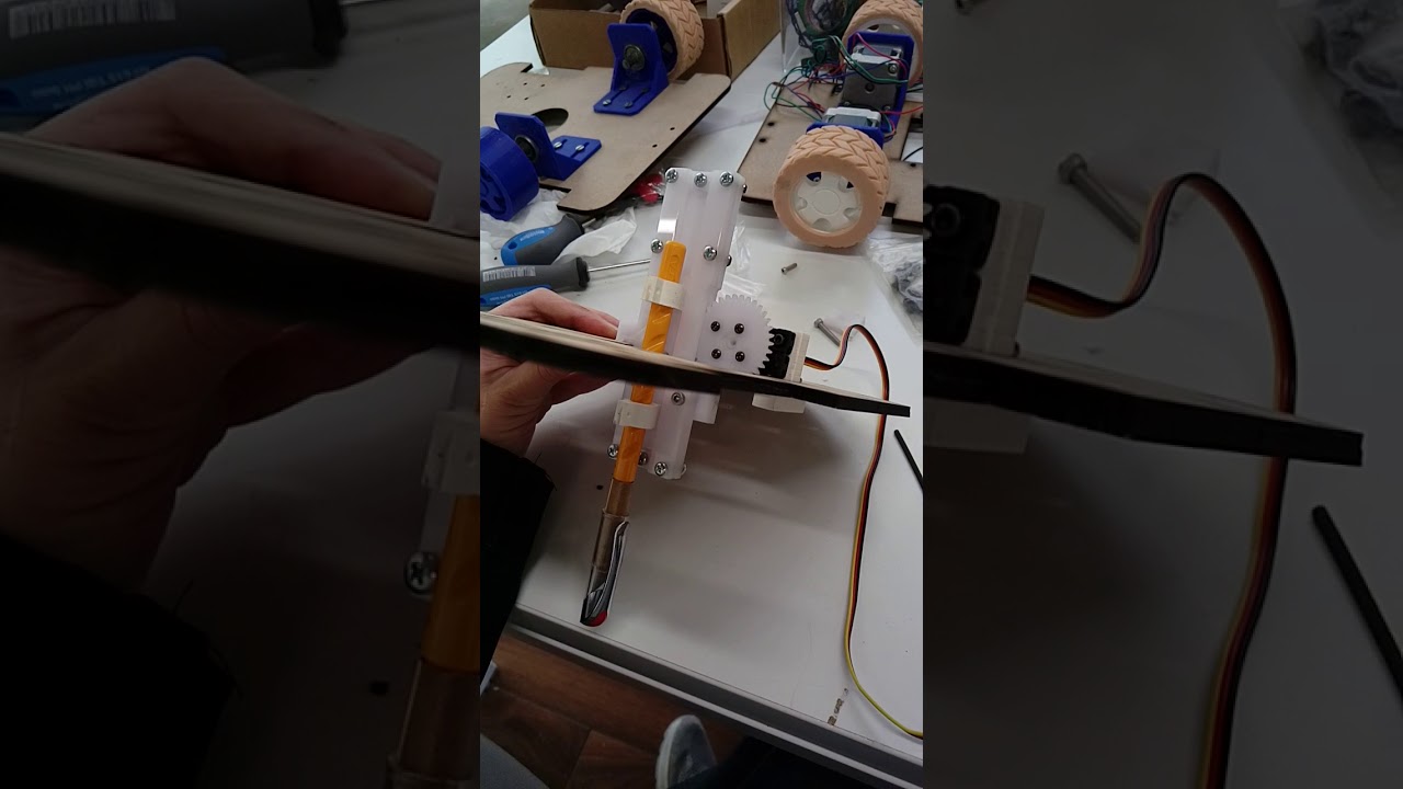 Servo pen holdeing mechanism - YouTube