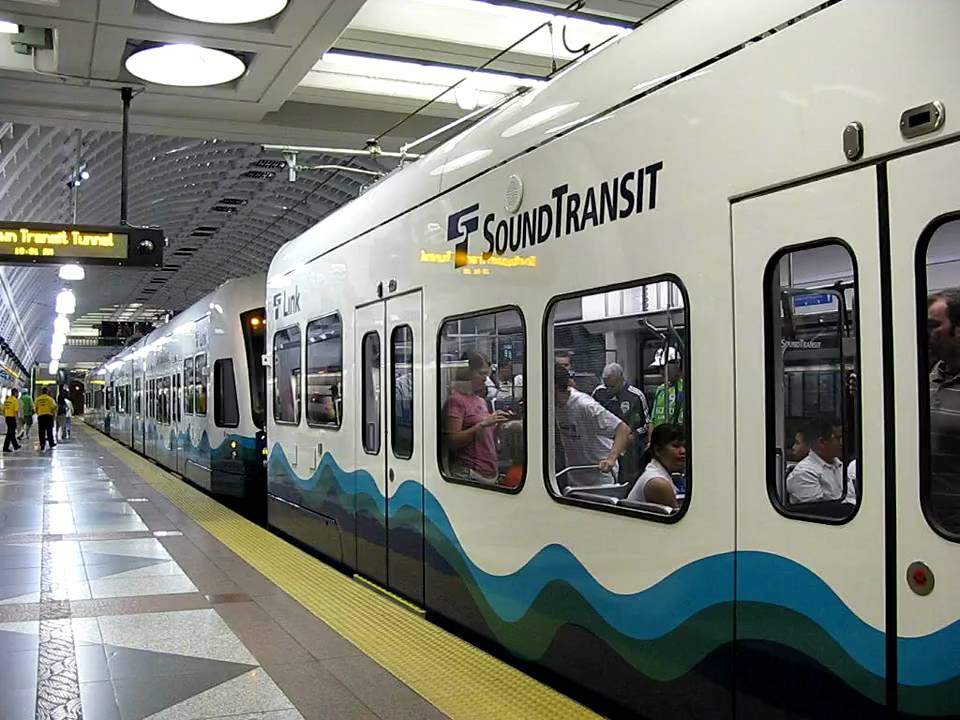 Link light rail Inaugural Train departs Pioneer Square Station - YouTube