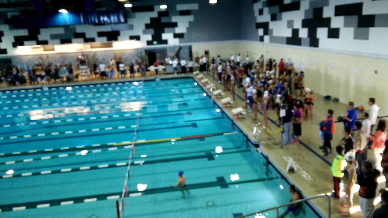 9 year old singing National Anthem at swim meet - YouTube